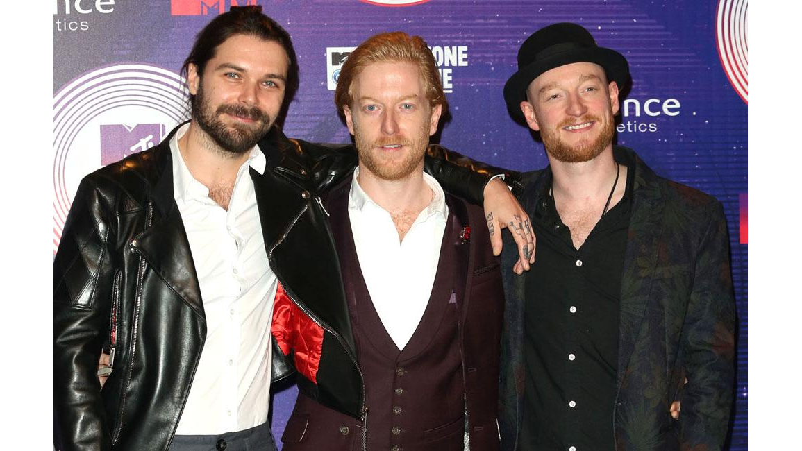 Simon Neil 'owes a bit of gratitude' to David Bowie - 8 Days