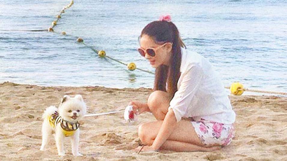 Hannah Quinlivan releases a photobook about her pet pooch - 8days
