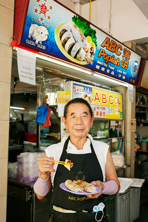 Hawker, 80, sells unique popiah with crabstick and fried fish, was ...