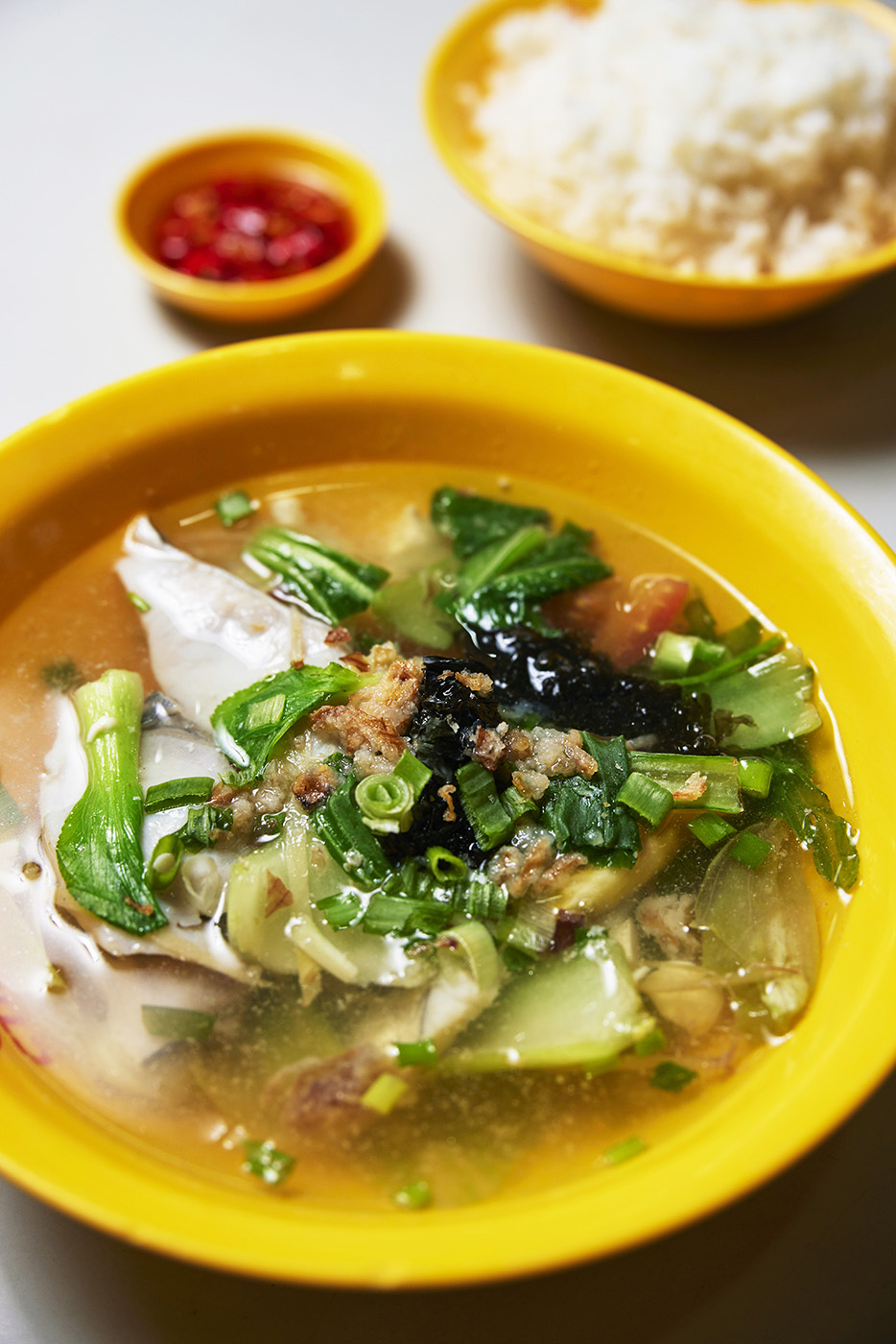 Forex dealer becomes fish soup hawker after being retrenched; his month ...